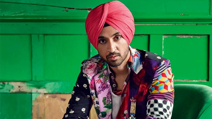 Diljit Dosanjh riding on with pink-blue combination - Bollywood Hungama
