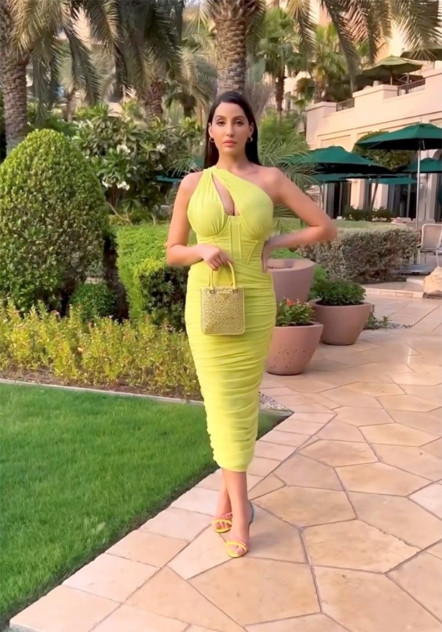 Nora Fatehi keeps it trendy in neon green one shoulder body-con dress ...