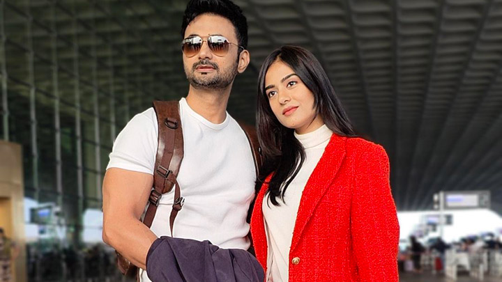 Amrita Rao and RJ Anmol pose for paps at the airport - Bollywood Hungama
