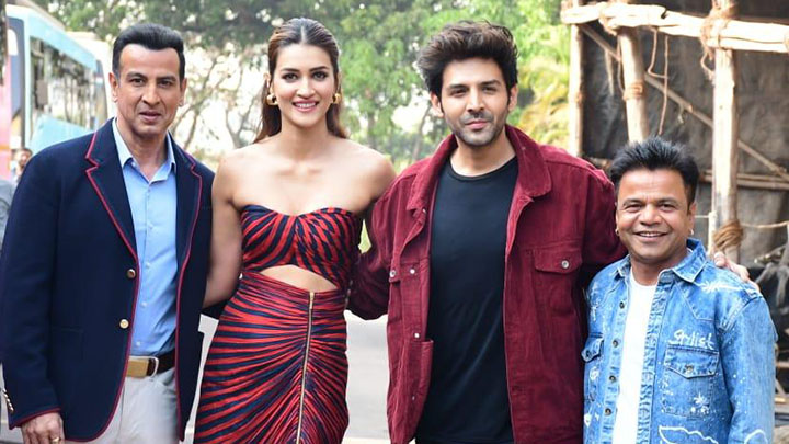 Shehzada pair, Kartik and Kriti twin in red as they get clicked outside Kapil Sharma show set ...