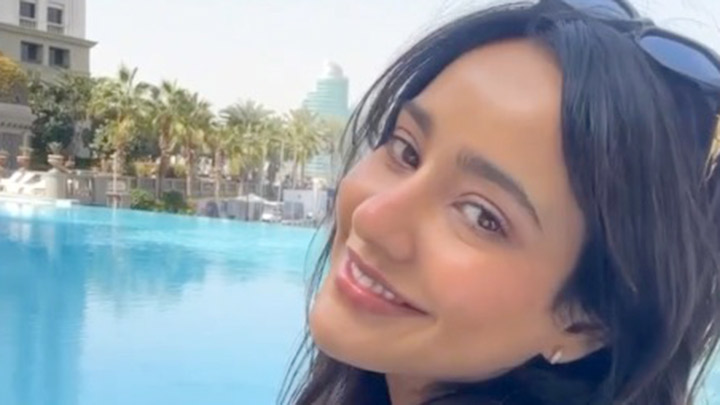 Neha Sharma has a wide smile spread across her face as she enjoys her ...