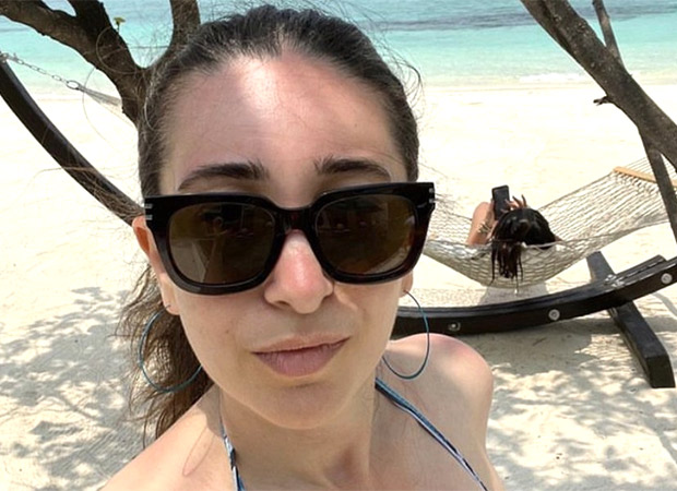 Karisma Kapoor enjoys summer sun in a blue bikini at the beach, sister ...