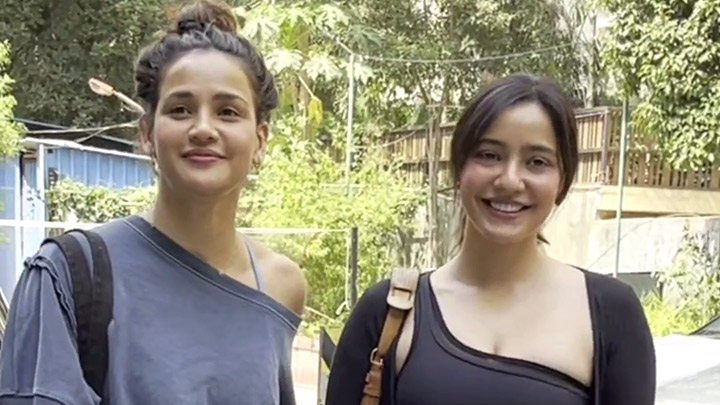 The sizzling Sharma's! Aisha & Neha smile for paps - Bollywood Hungama