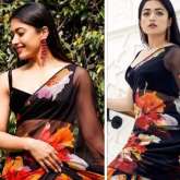Rashmika Mandanna exuded sheer elegance as she adorned herself in a stunning dark floral saree ...