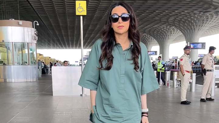 The Lolo effect! Karisma Kapoor strikes a pose for paps at the airport ...