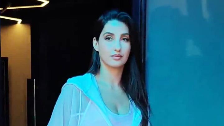 Nora Fatehi flaunts her Louis Vuitton bag as she poses for paps ...