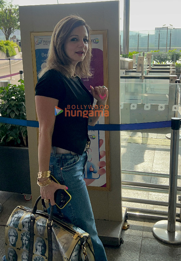 Photos: Sussanne Khan and Madhur Bhandarkar snapped at the airport ...